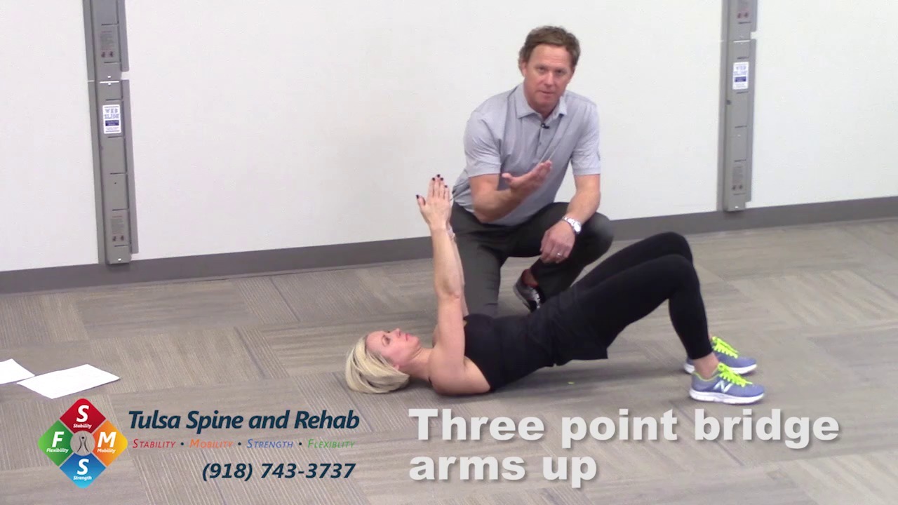 Fit Tip: Three-Point Bridge - Arms Up | Tulsa Spine and Rehab